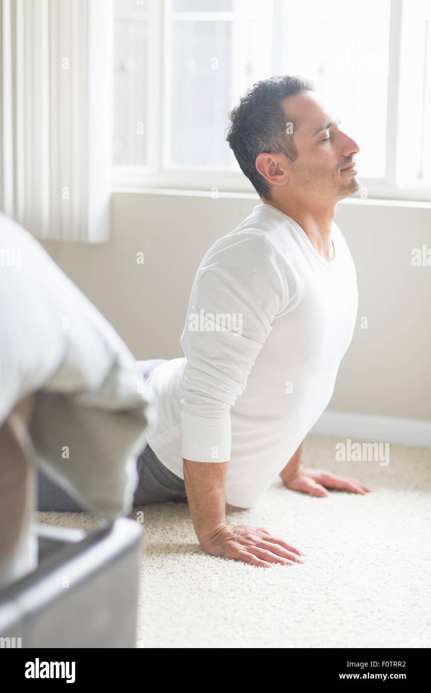 Yoga position man hi-res stock photography and images - Alamy