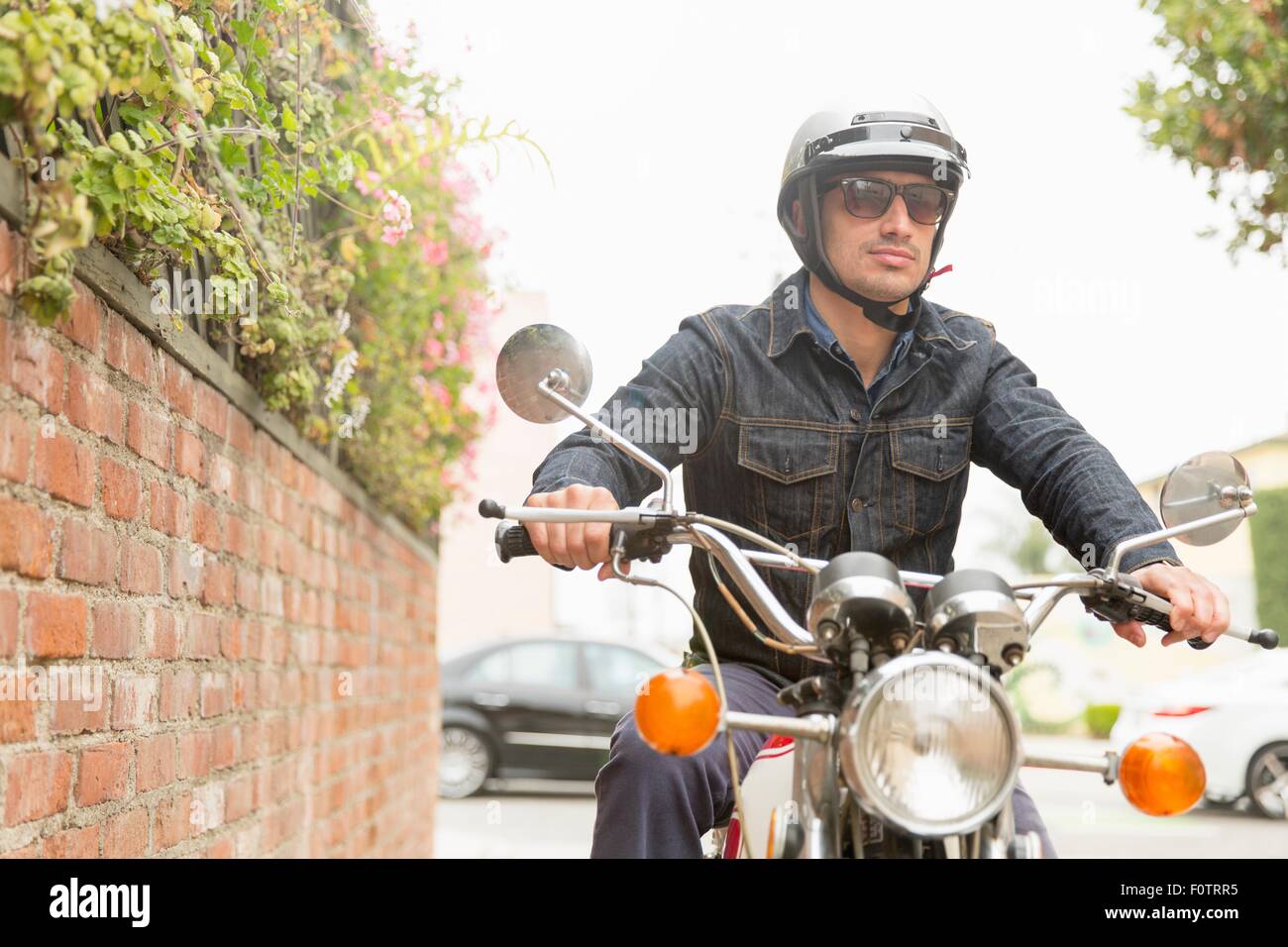 Man riding hi-res stock photography and images - Alamy