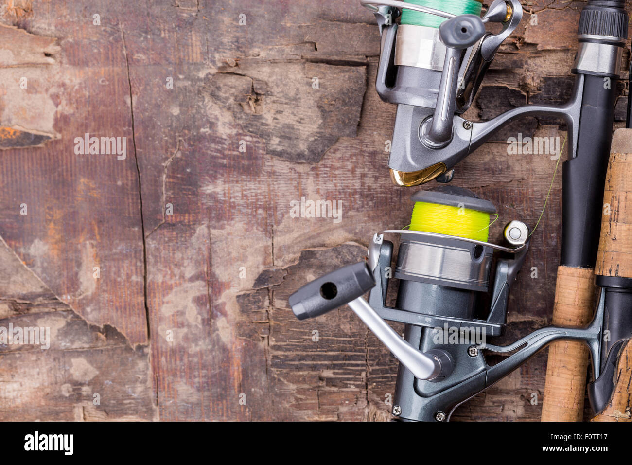 fishing rod and reel with line on natural background for frame, print ...