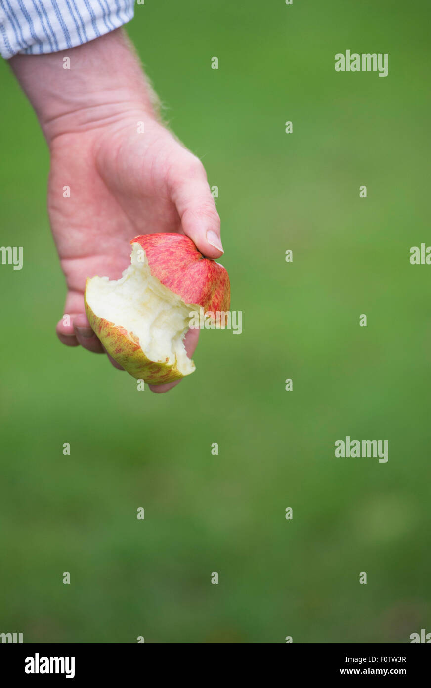 Man hand eating hi-res stock photography and images - Alamy