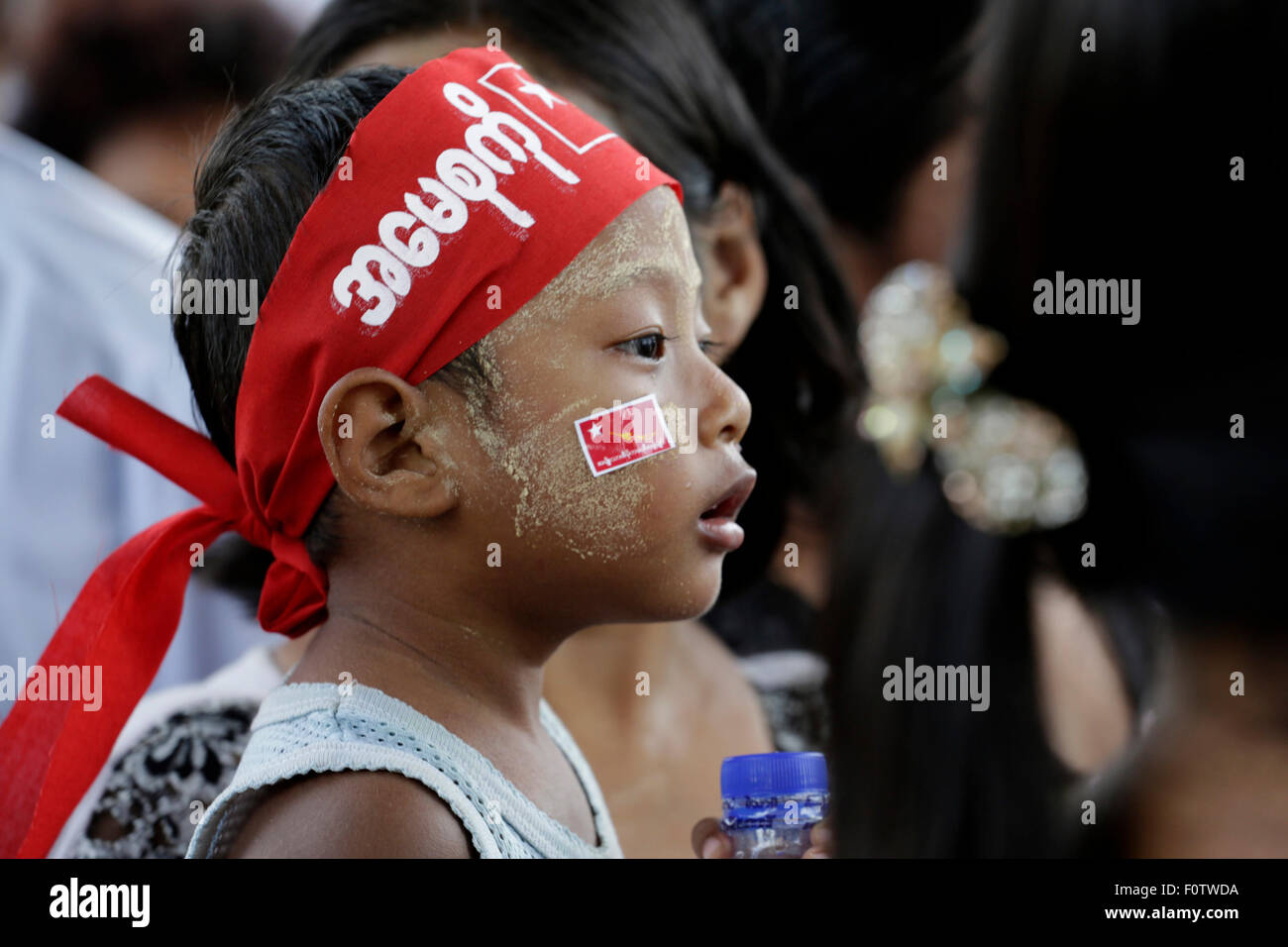 Yangon, Myanmar. 21st Aug, 2015. A child with a Myanmar's National ...