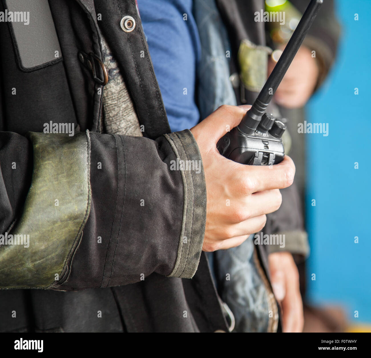 Firefighter Holding Walkie Talkie Stock Photo - Alamy