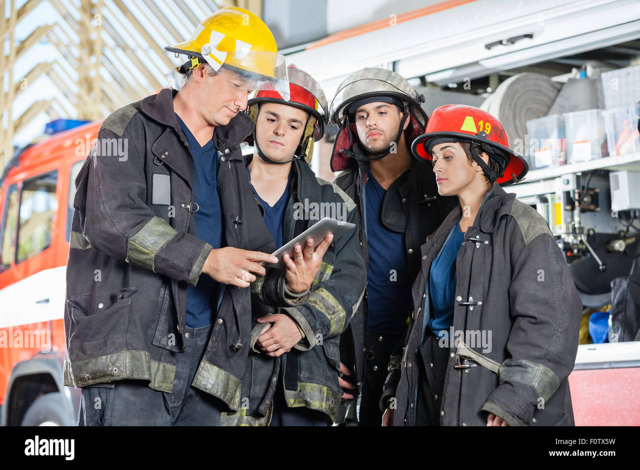 Team of firefighters hi-res stock photography and images - Alamy