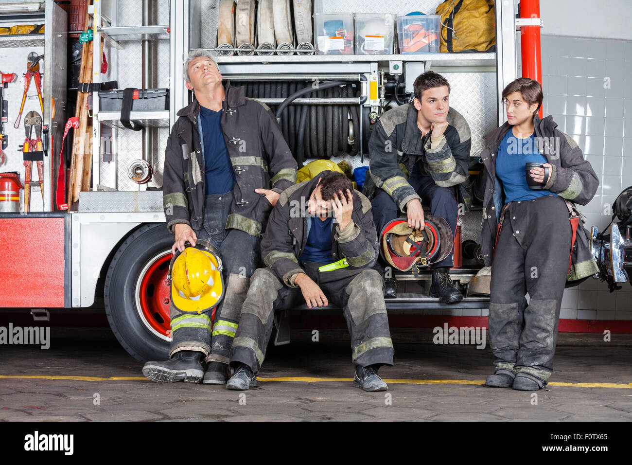 Tired firefighters hi-res stock photography and images - Alamy
