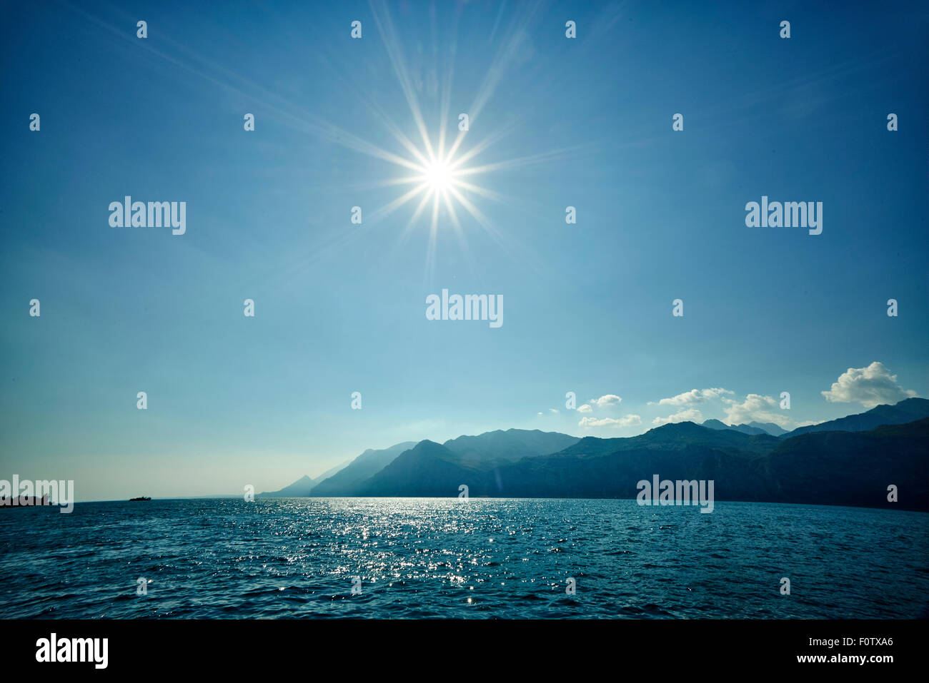 Water mountains sun hi-res stock photography and images - Alamy