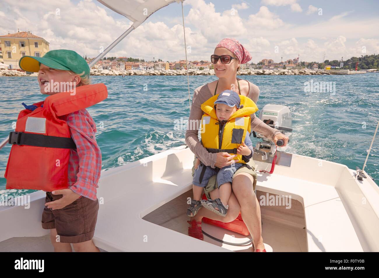 Two boys on boat hi-res stock photography and images - Alamy
