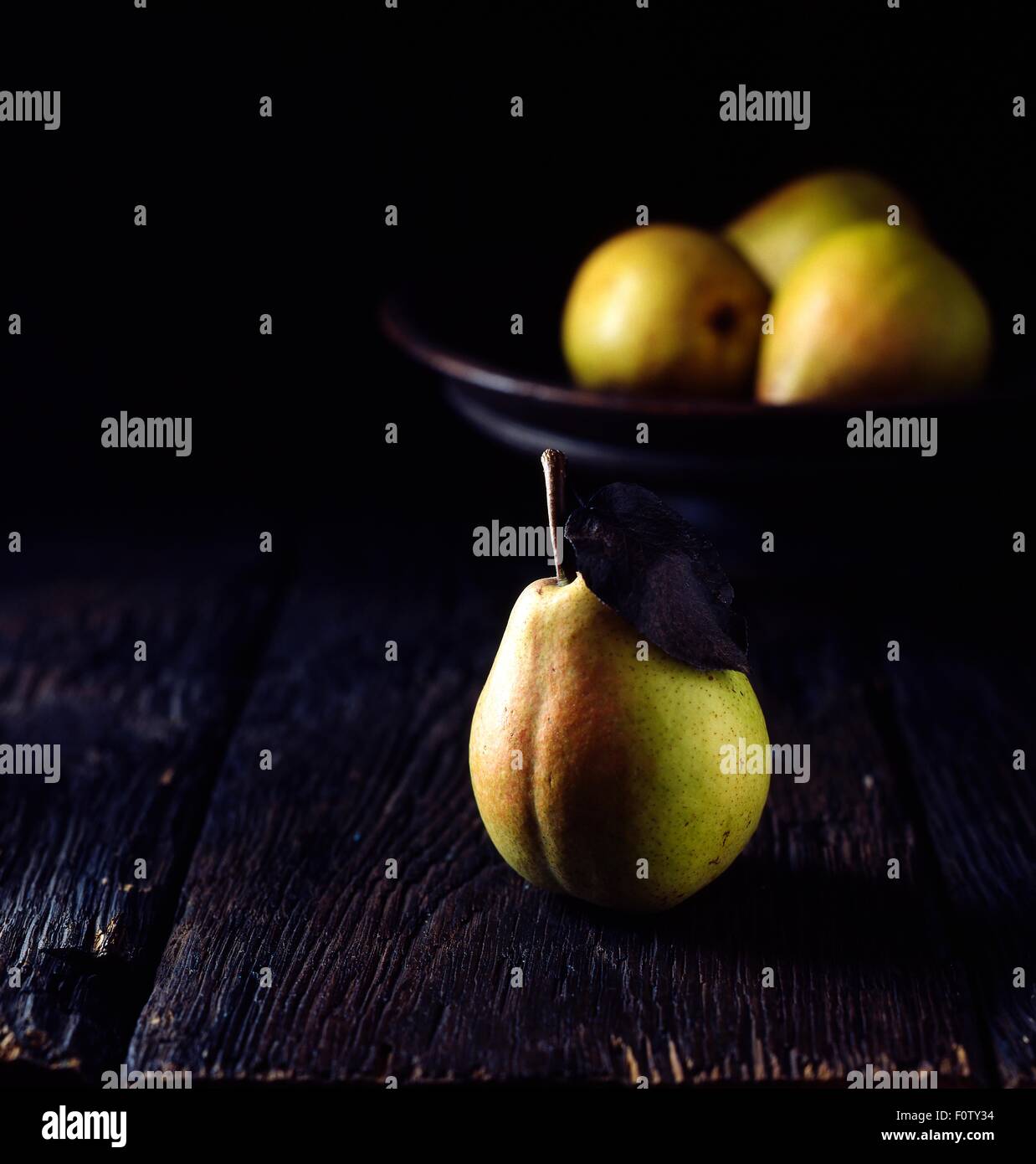 Four fresh small pears Stock Photo - Alamy