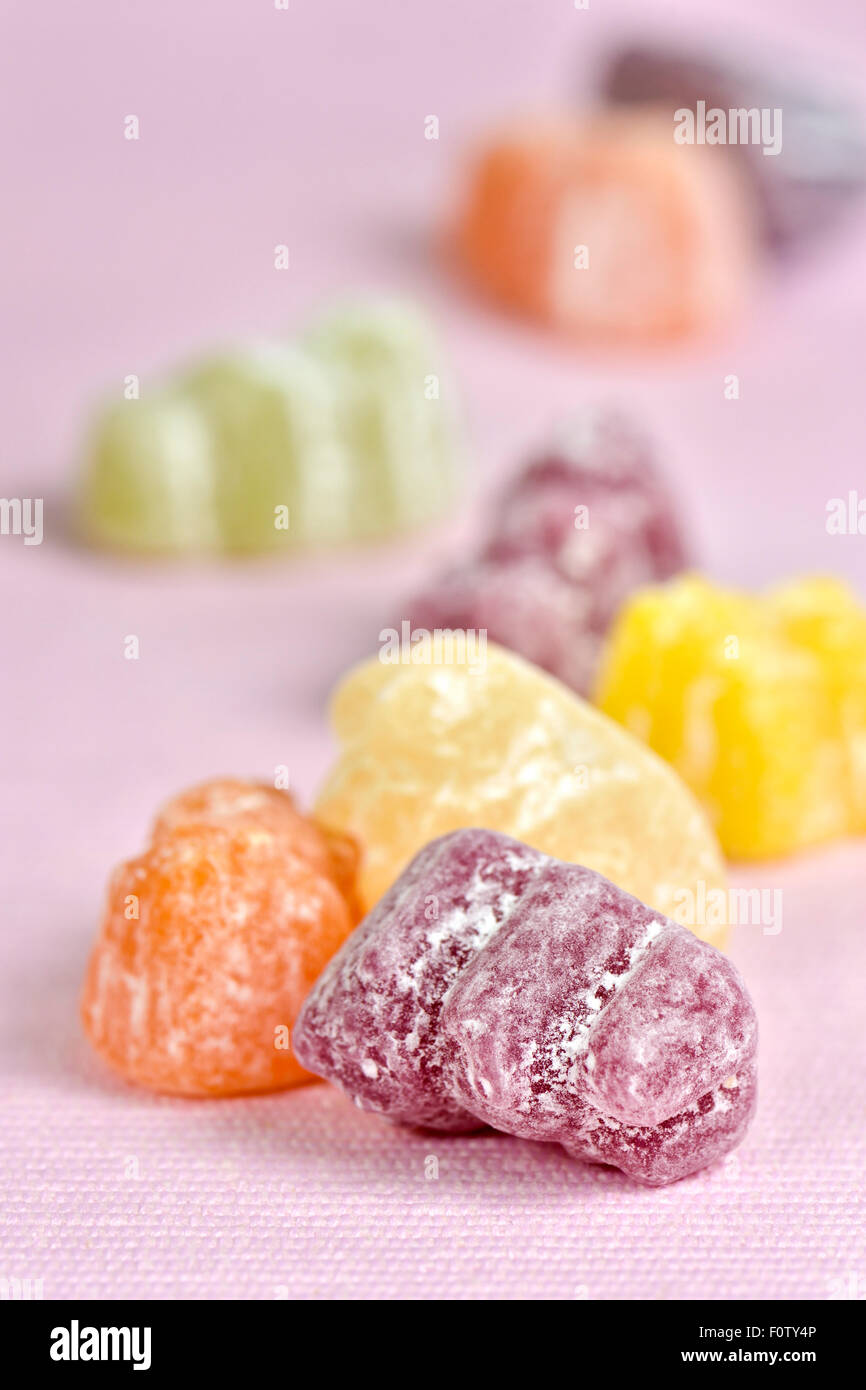 Jelly babies on pink background Stock Photo - Alamy
