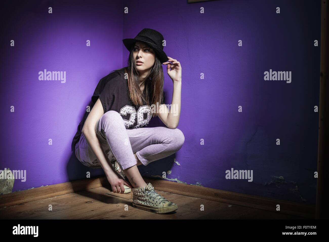 Person alone corner hi-res stock photography and images - Alamy