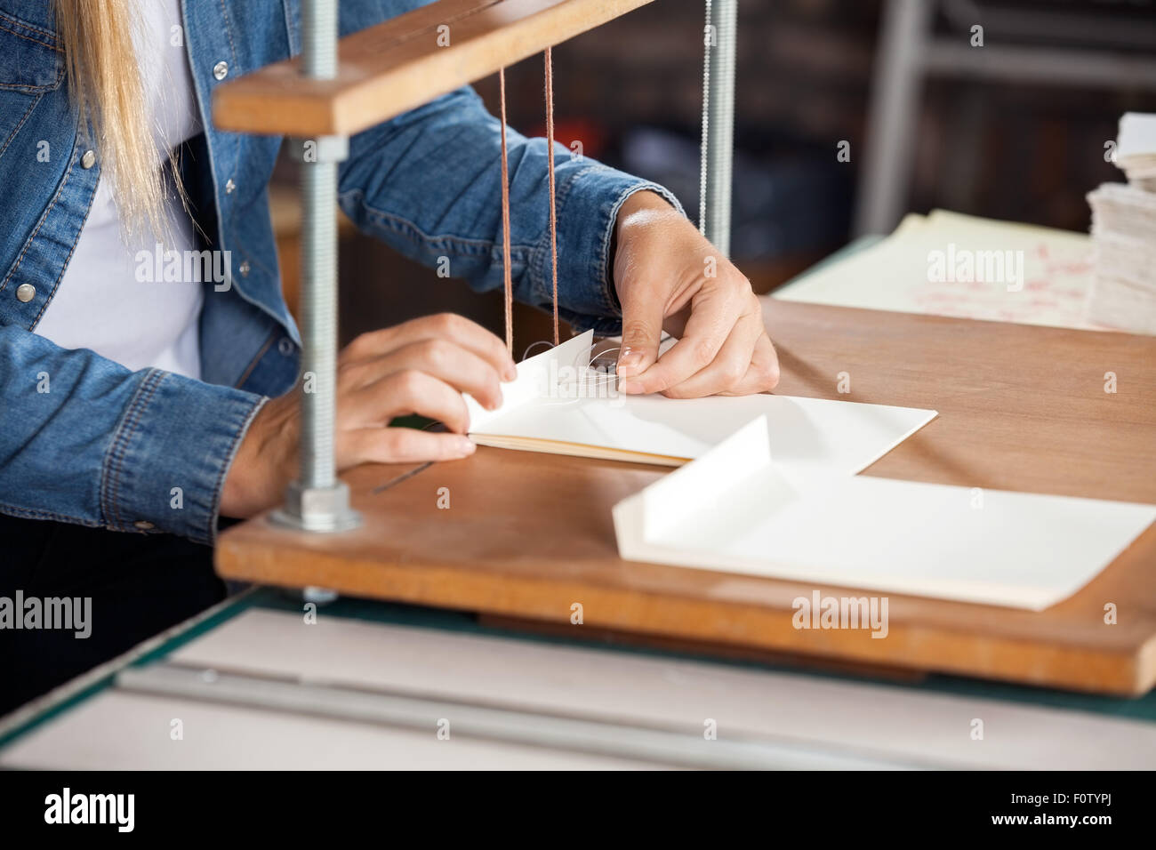 Bookbinding process hi-res stock photography and images - Alamy