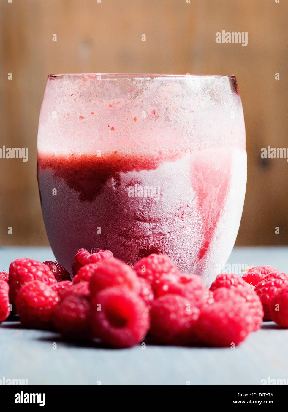 Frozen raspberry smoothie with fresh raspberries Stock Photo - Alamy