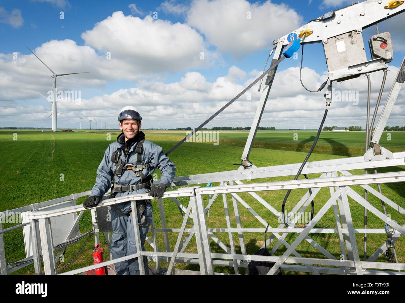 Wind turbine worker standing hi-res stock photography and images - Alamy