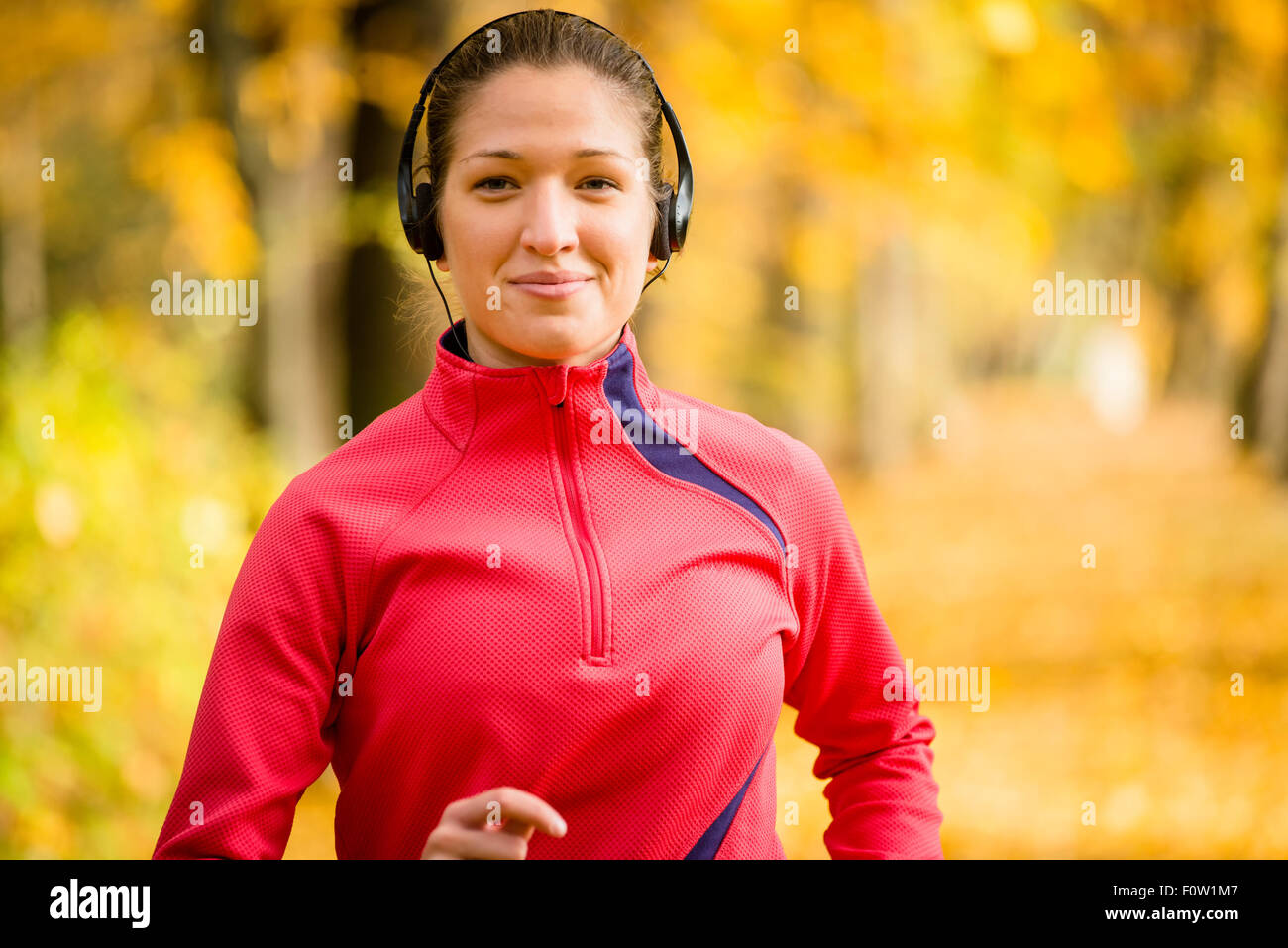 Woman and running and headphones hi-res stock photography and images ...