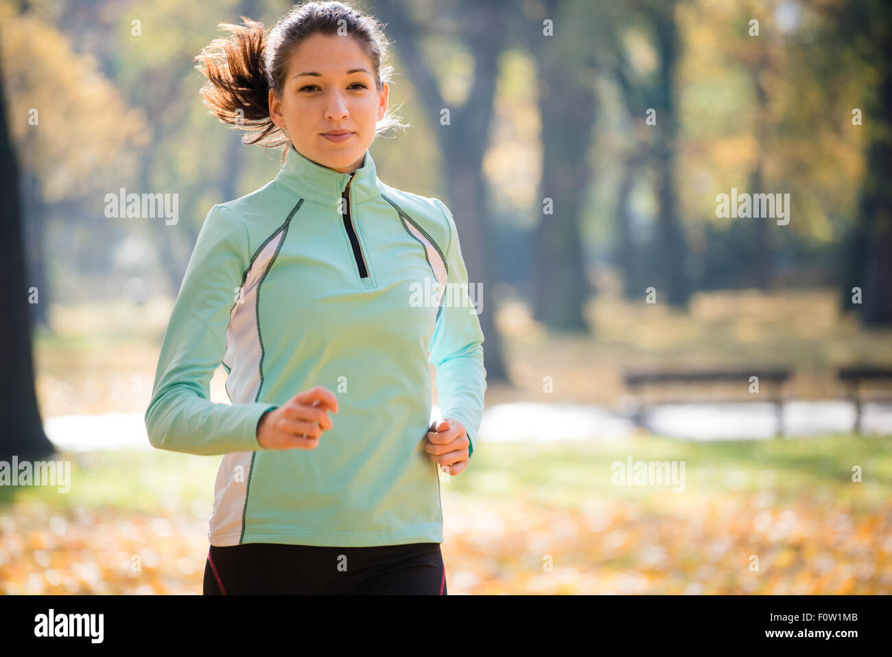 Beautiful young jogging woman hi-res stock photography and images - Alamy