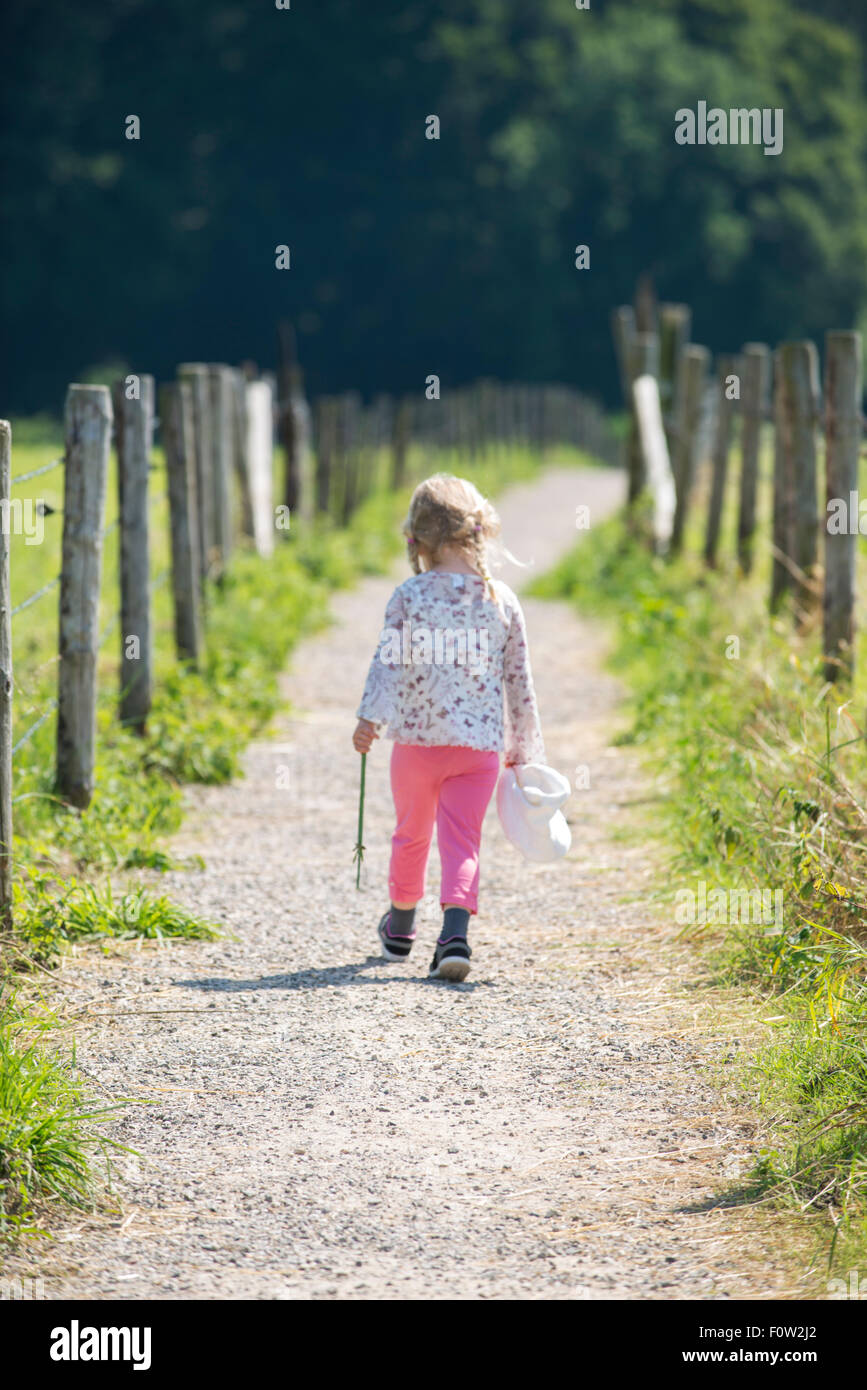 Girl on pathway hi-res stock photography and images - Alamy