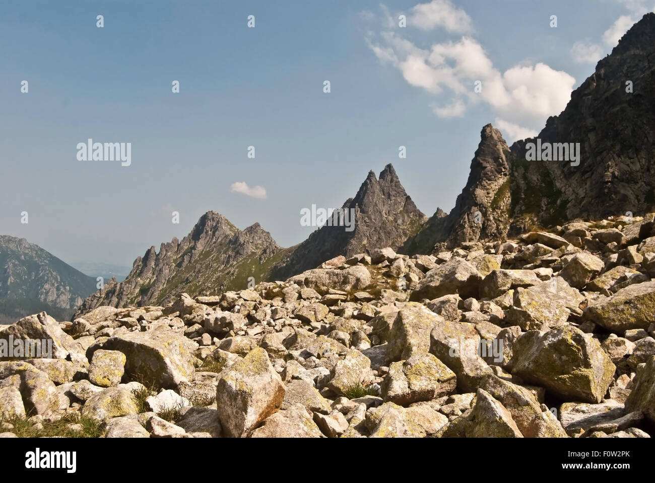 groupf pf sharp peaks with stones on the background during hiking to ...