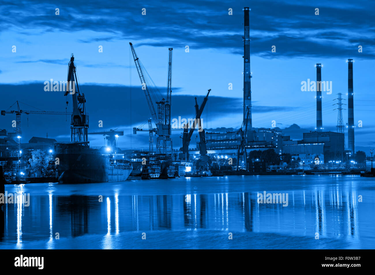 Shipyard at night - industry concept Stock Photo - Alamy