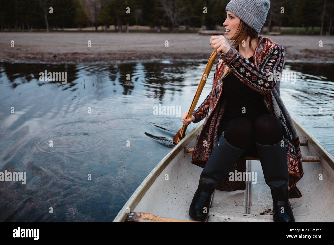 Woman rowing boat hi-res stock photography and images - Alamy