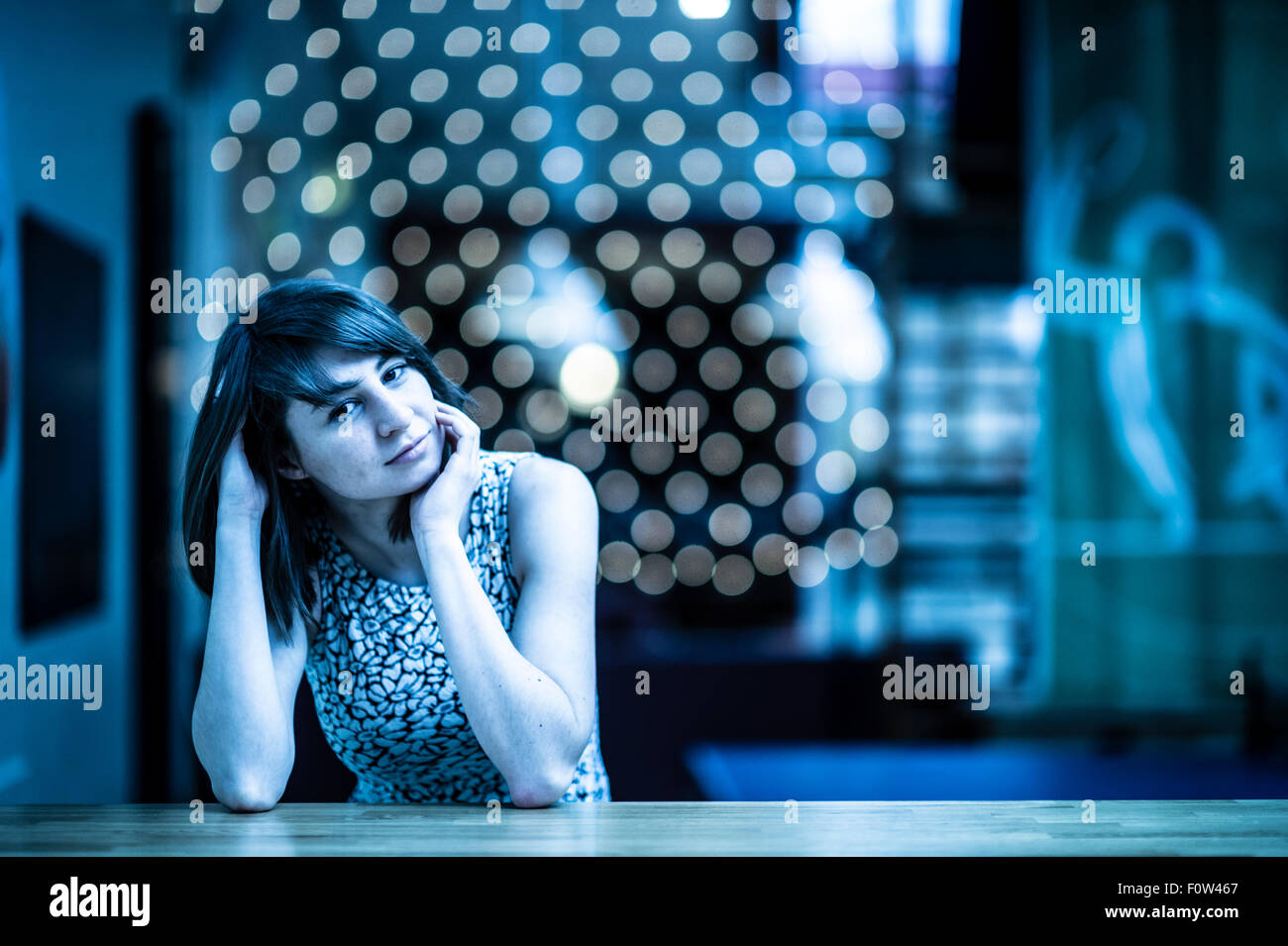Sitting modelling pose hi-res stock photography and images - Alamy