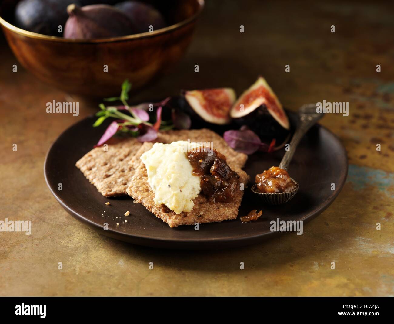 Stilton pate, fig, date chutney on brown ceramic plate Stock Photo - Alamy
