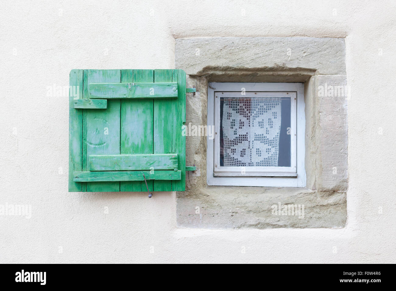 Small window and wooden shutter Stock Photo - Alamy