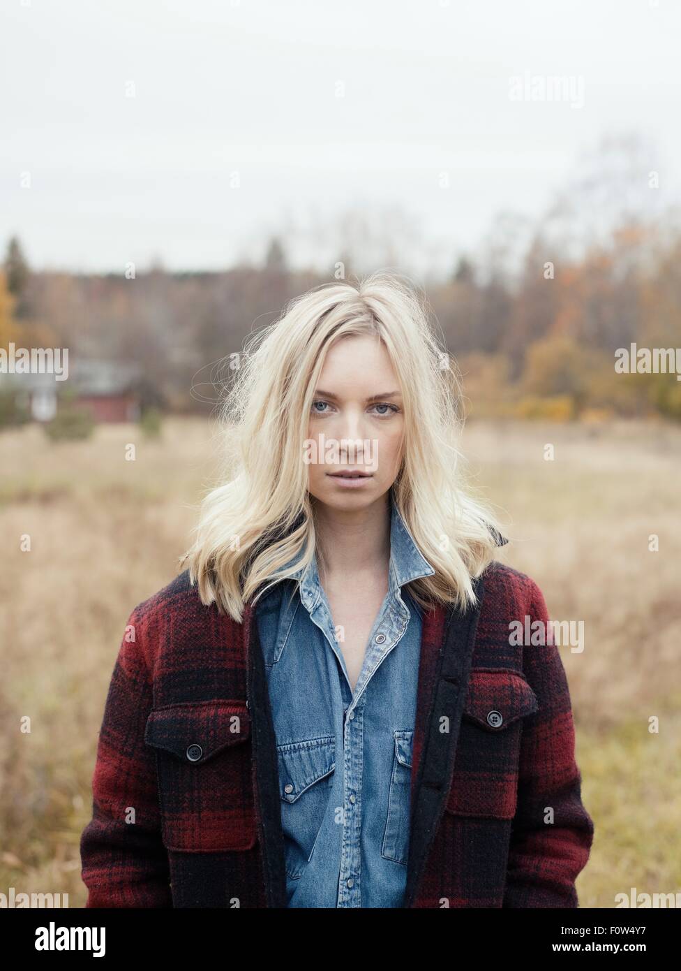 Portrait of young woman in rural setting Stock Photo - Alamy