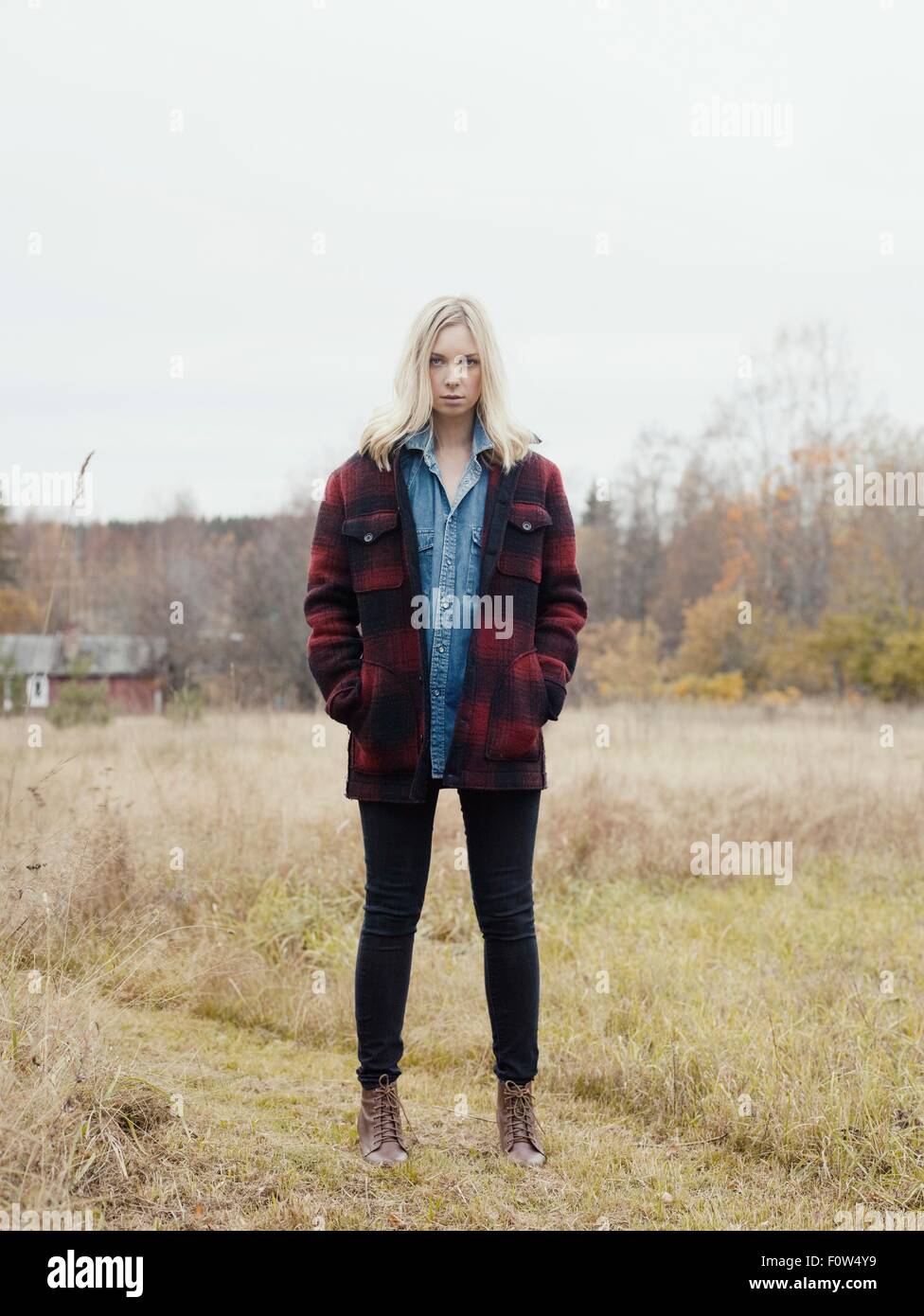 Portrait of young woman in rural setting Stock Photo - Alamy