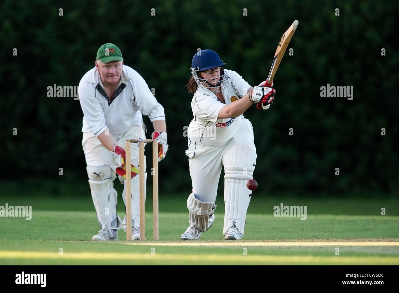 Female cricketer hitting ball hi-res stock photography and images - Alamy