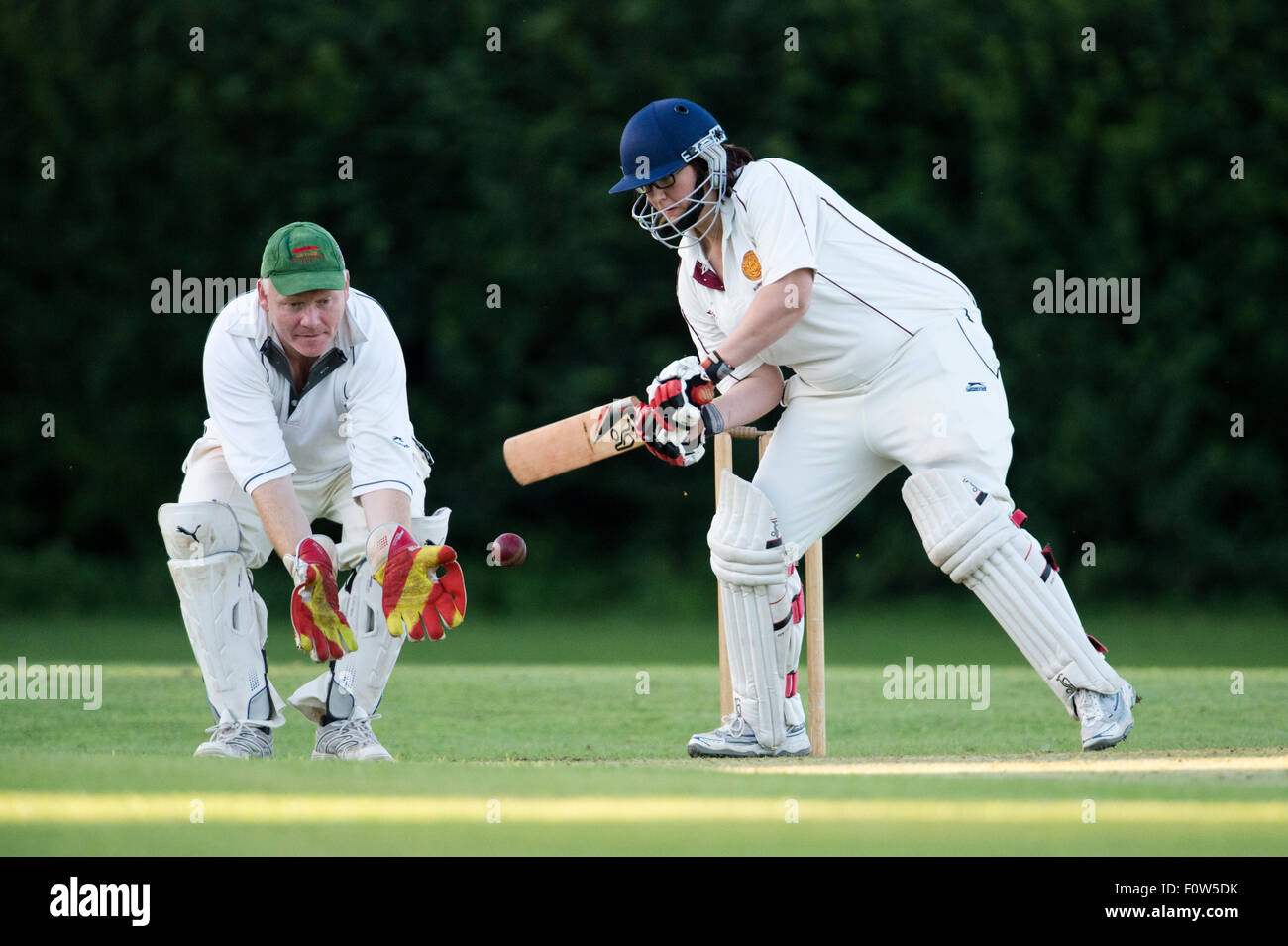 Female cricketer hitting ball hi-res stock photography and images - Alamy