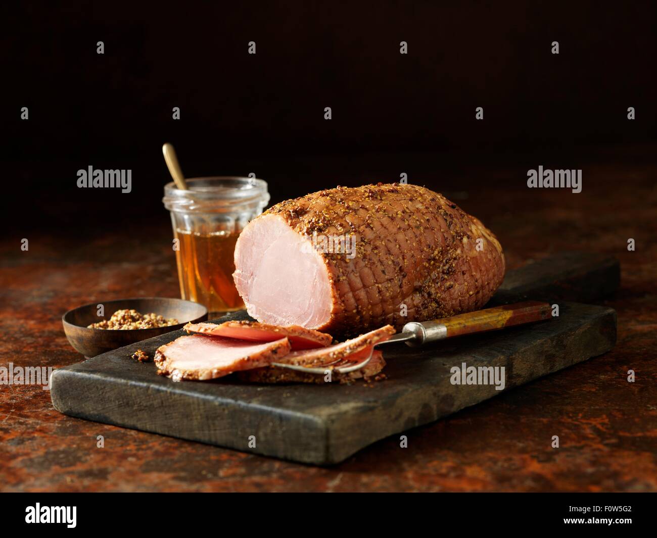 Carved glazed ham Stock Photo - Alamy