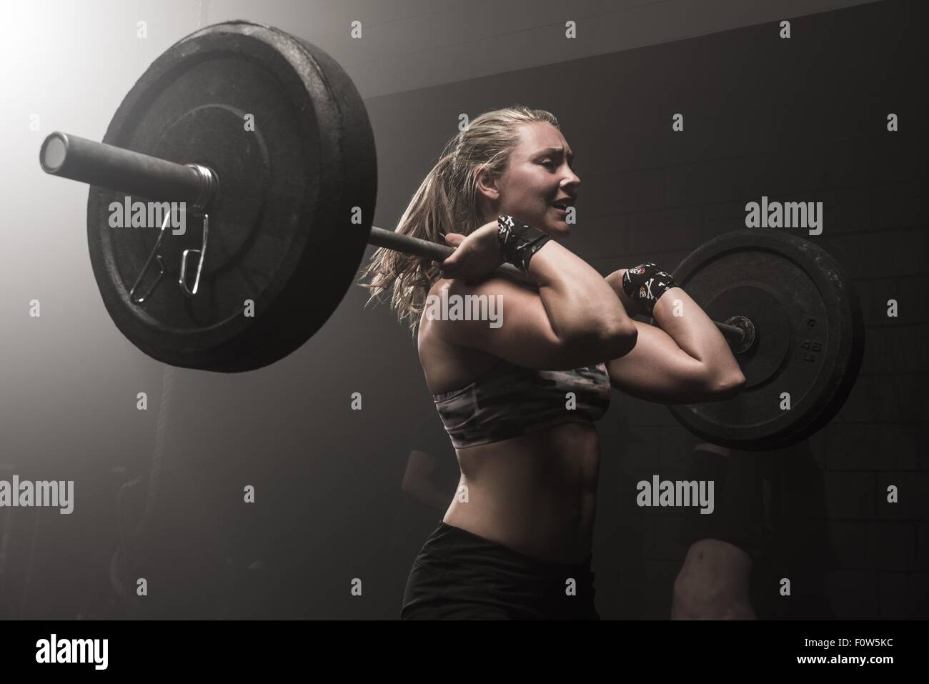 People man trying lift weight hi-res stock photography and images - Alamy