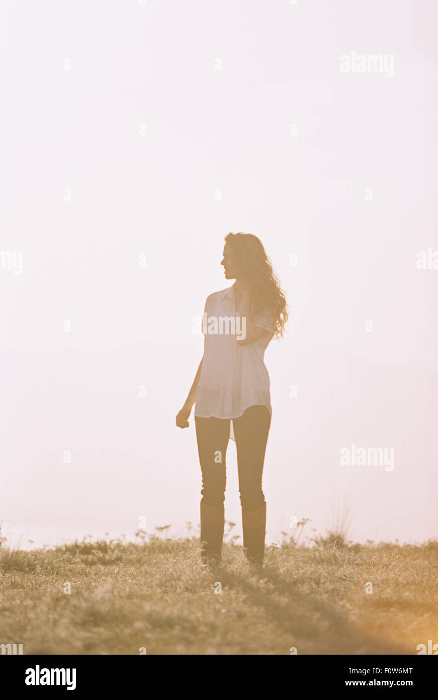 Person standing alone hi-res stock photography and images - Alamy