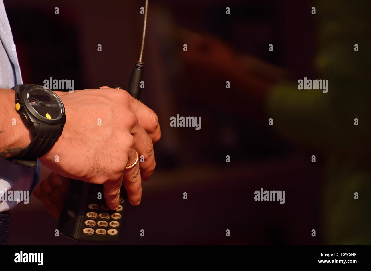 Security Guard Hand Holding Cb High Resolution Stock Photography and ...