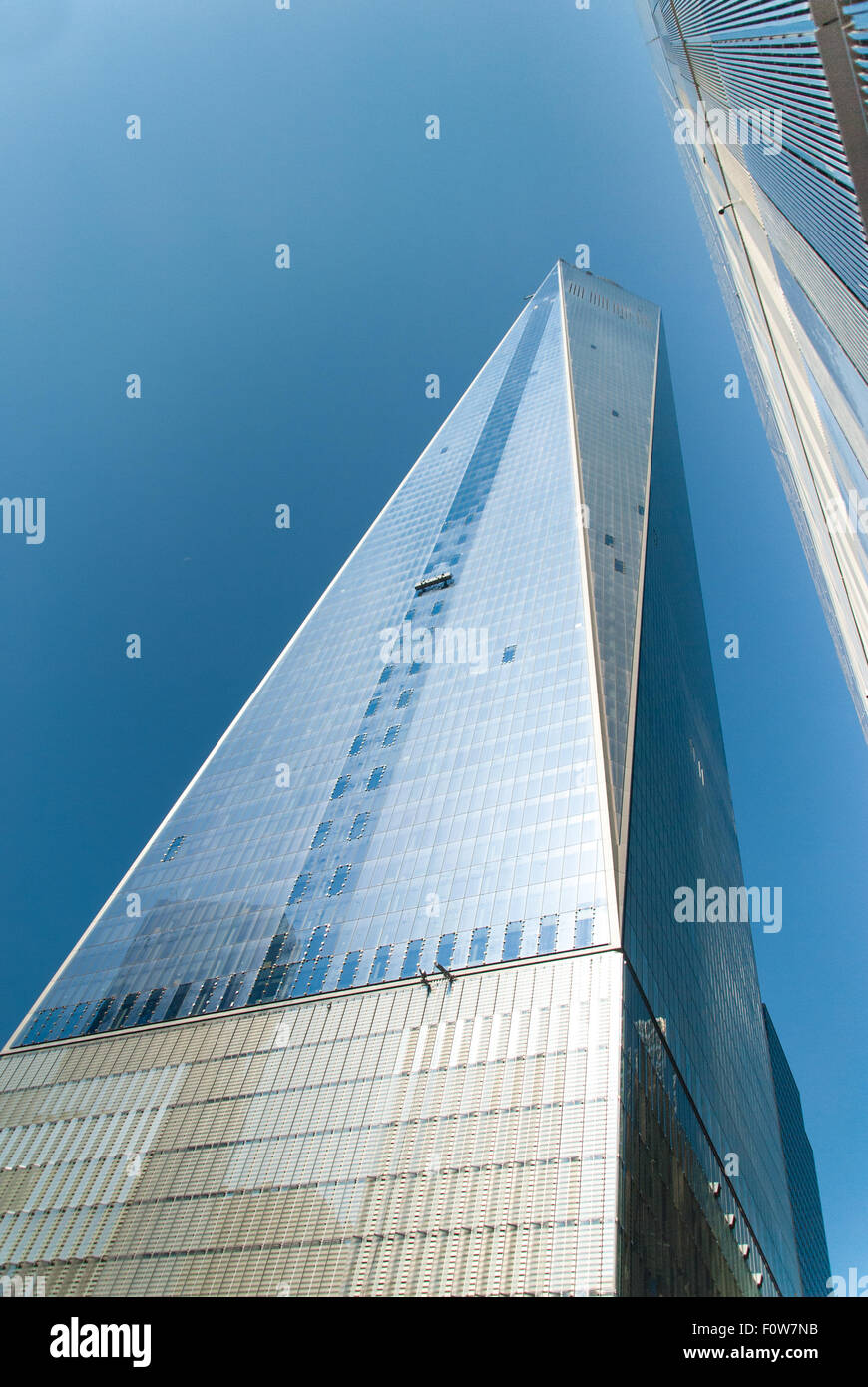 One World Trade Center rising up high in the portrait orientation shot ...