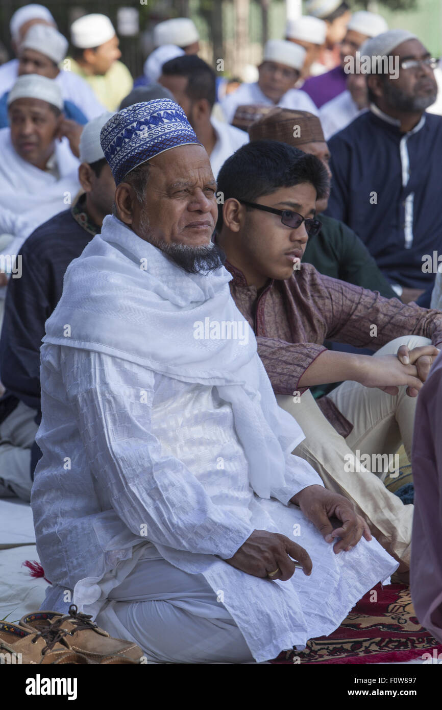 Muslims pray outside a mosque in Kensington, Brooklyn, NY for "Eid al ...