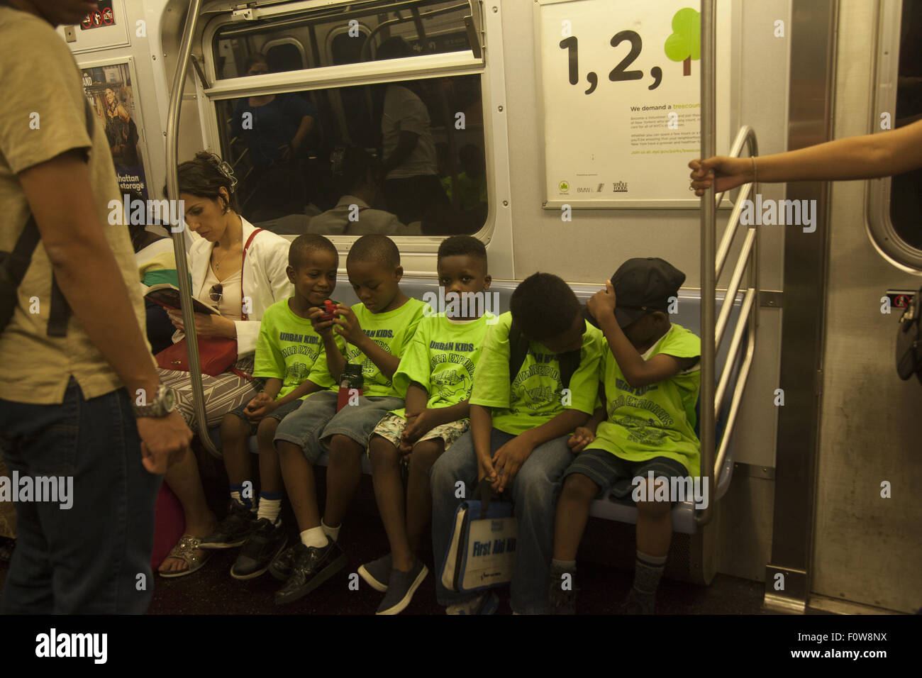 Children riding new york subway hi-res stock photography and images - Alamy