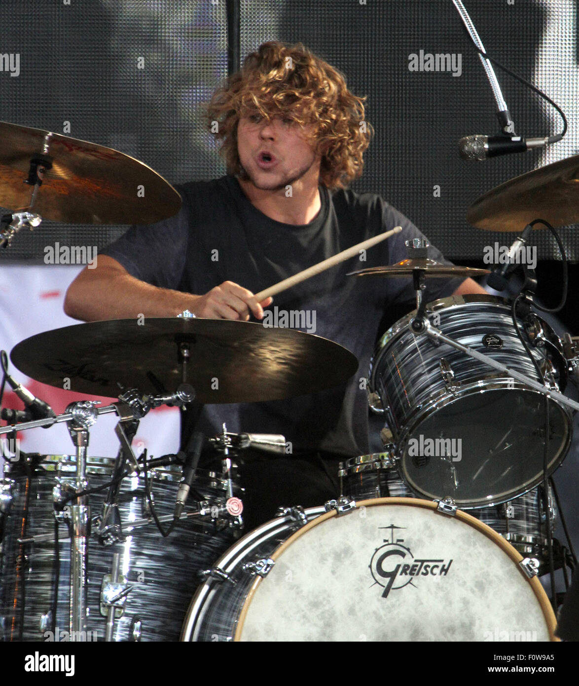 New York, USA. 21st Aug, 2015. Musician ASHTON IRWIN from the band 5 ...