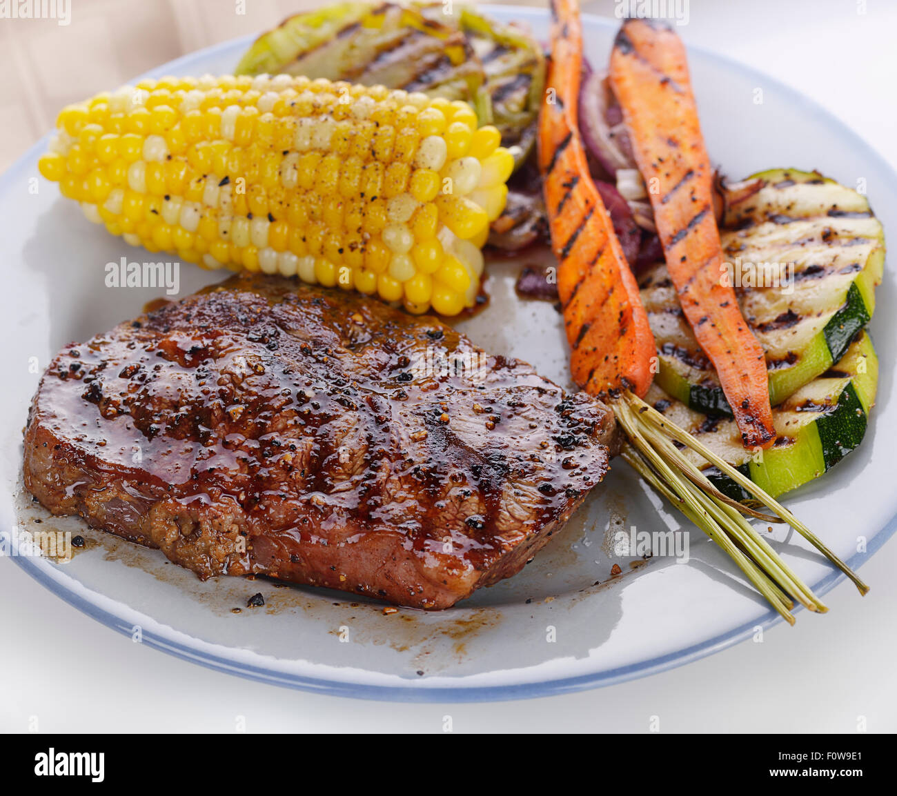 Beef Steak with Grilled Vegetables Stock Photo - Alamy
