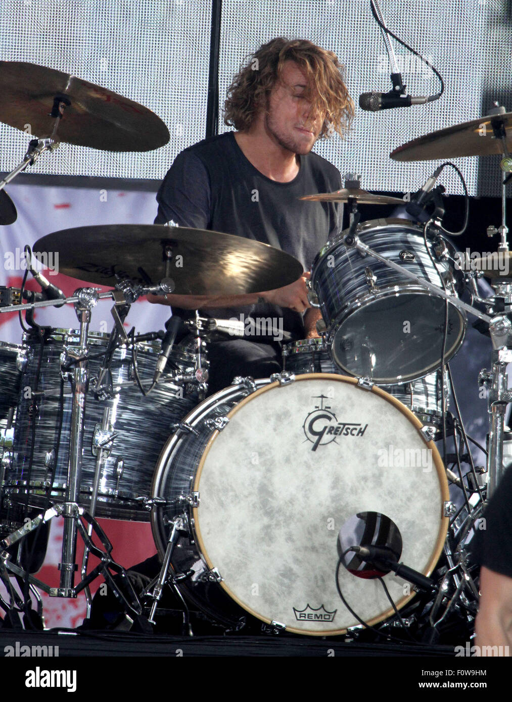 New York, USA. 21st Aug, 2015. Musician ASHTON IRWIN from the band 5 ...