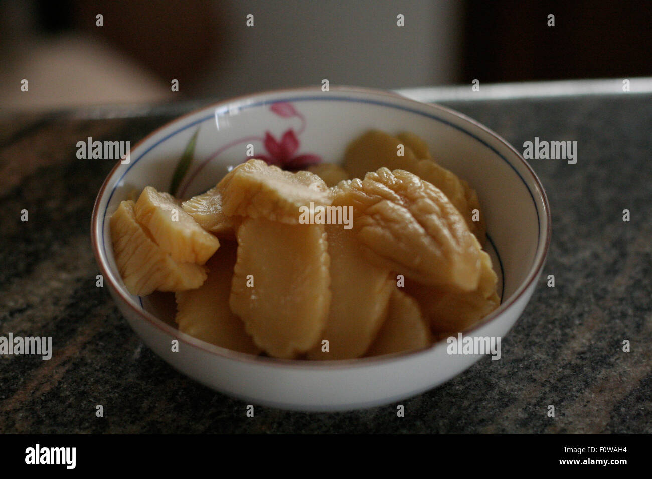 Small bowl of takuan Japanese pickled radish Stock Photo - Alamy