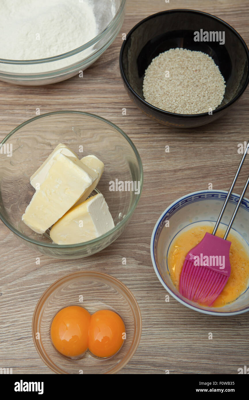 Baking ingredients on a wood table Stock Photo - Alamy