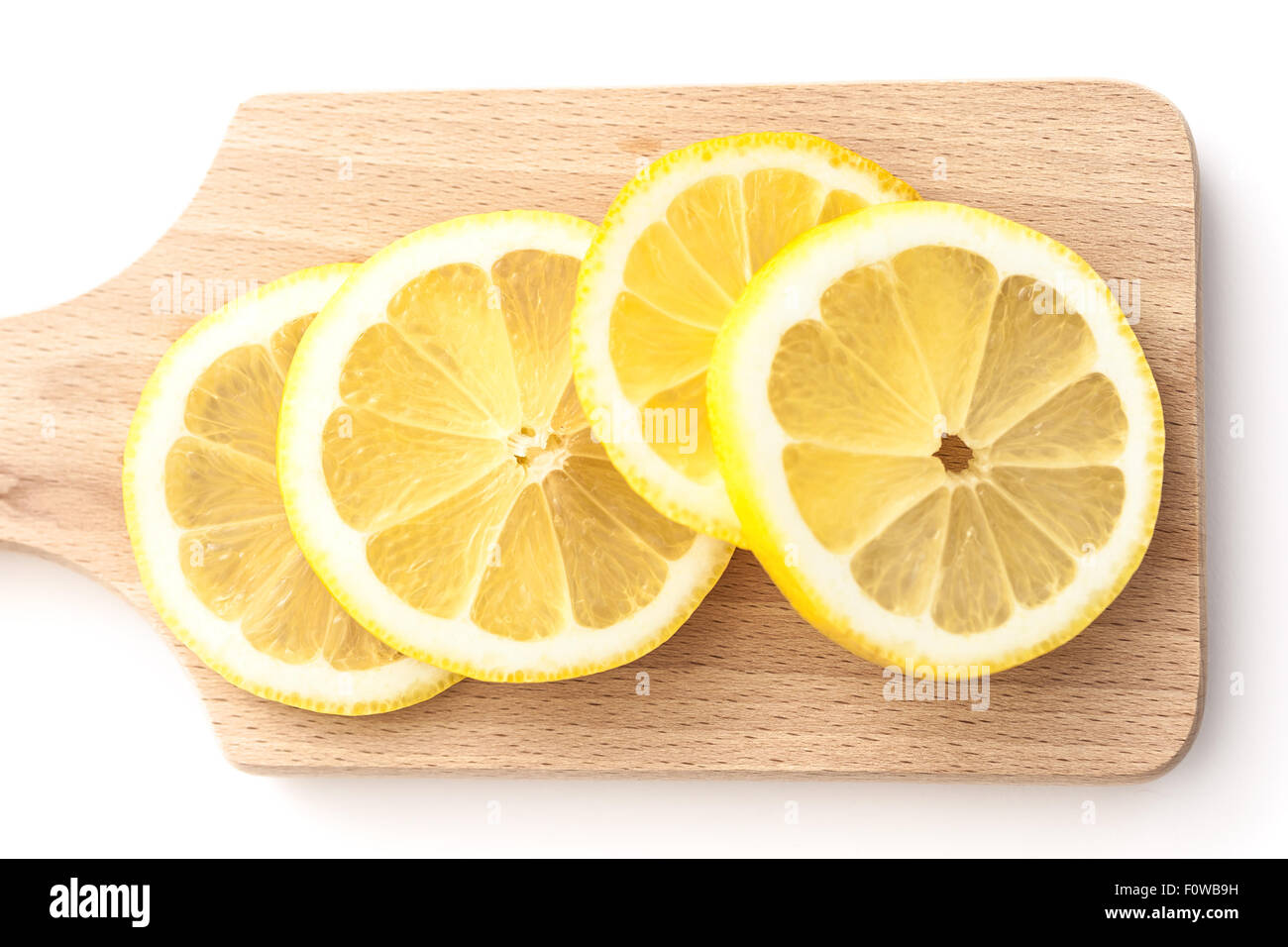 Top view on sliced lemons on a cutting board Stock Photo - Alamy