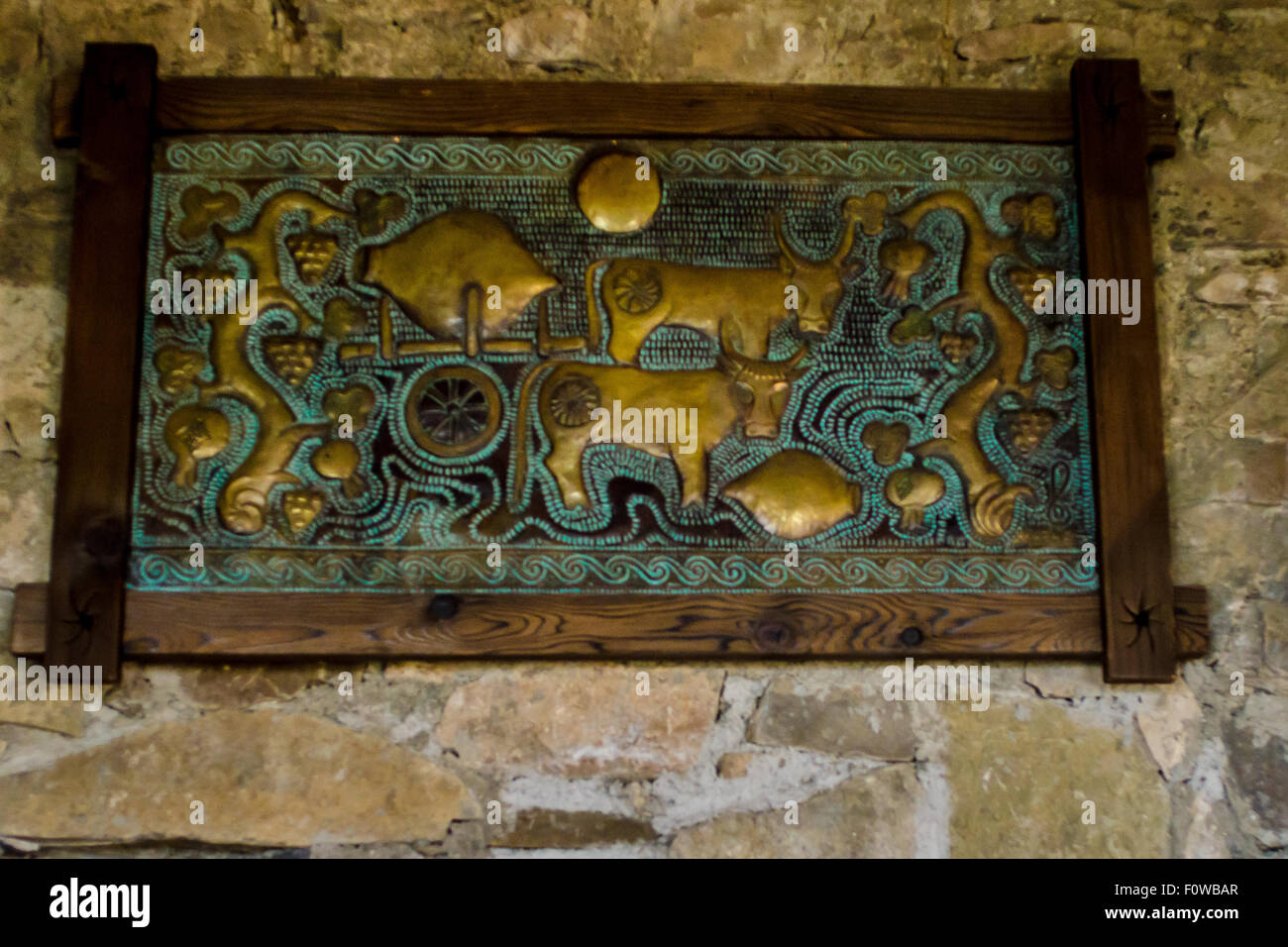 Detailed relief artwork depicting animals and nature in a historical ...