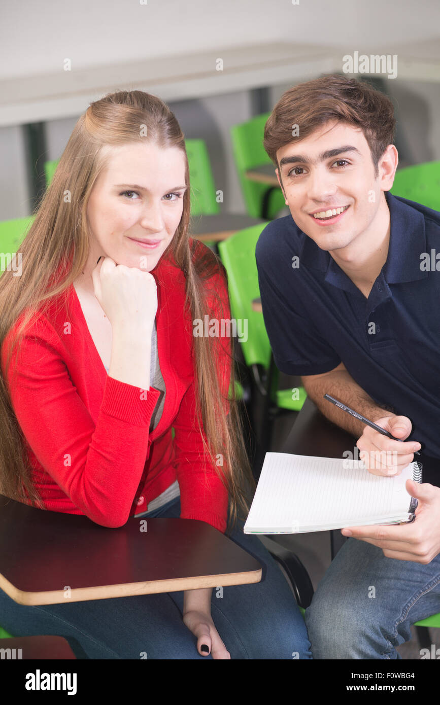 Boy and girl studying together Stock Photo - Alamy