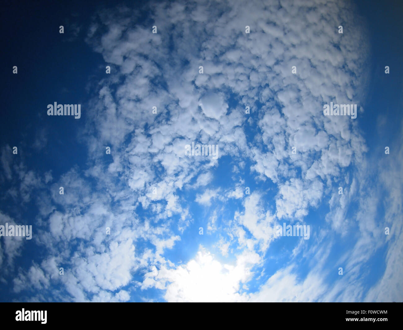 Only the sky with bright clouds with wide angle view Stock Photo - Alamy