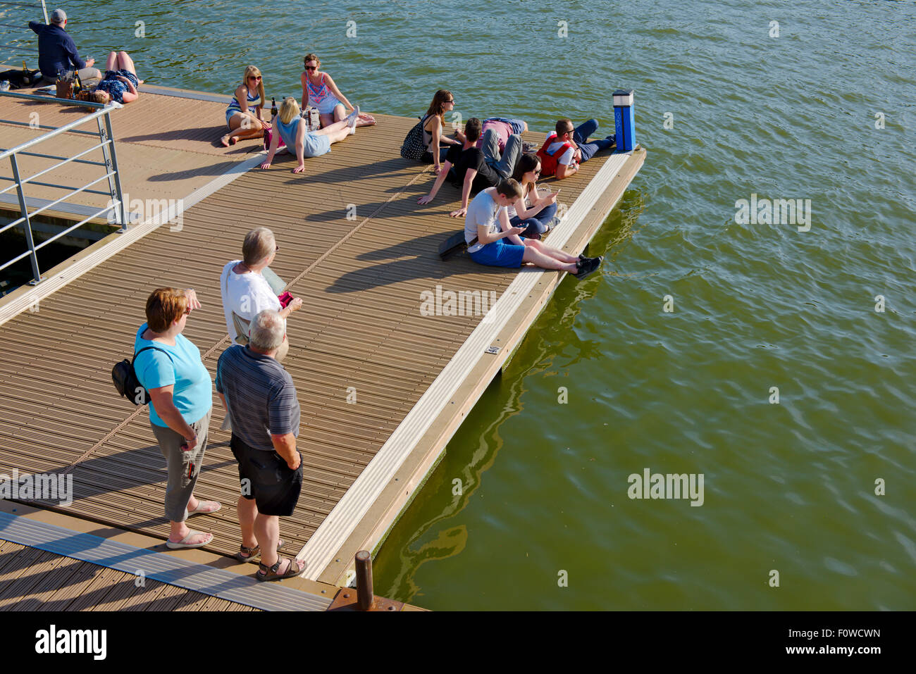 People on dock Stock Photo - Alamy