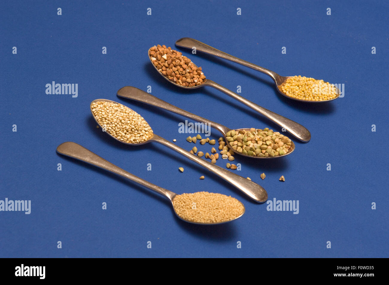 A selection of edible grains including,top to bottom,millet,roast ...
