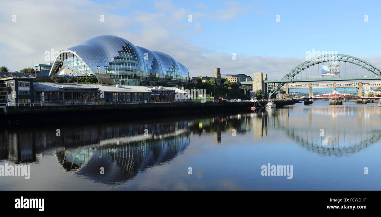 The Sage Gateshead performing arts centre and Tyne Bridge in Newcastle ...