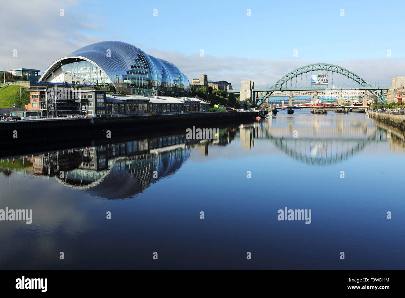 The Sage Gateshead performing arts centre and Tyne Bridge in Newcastle ...