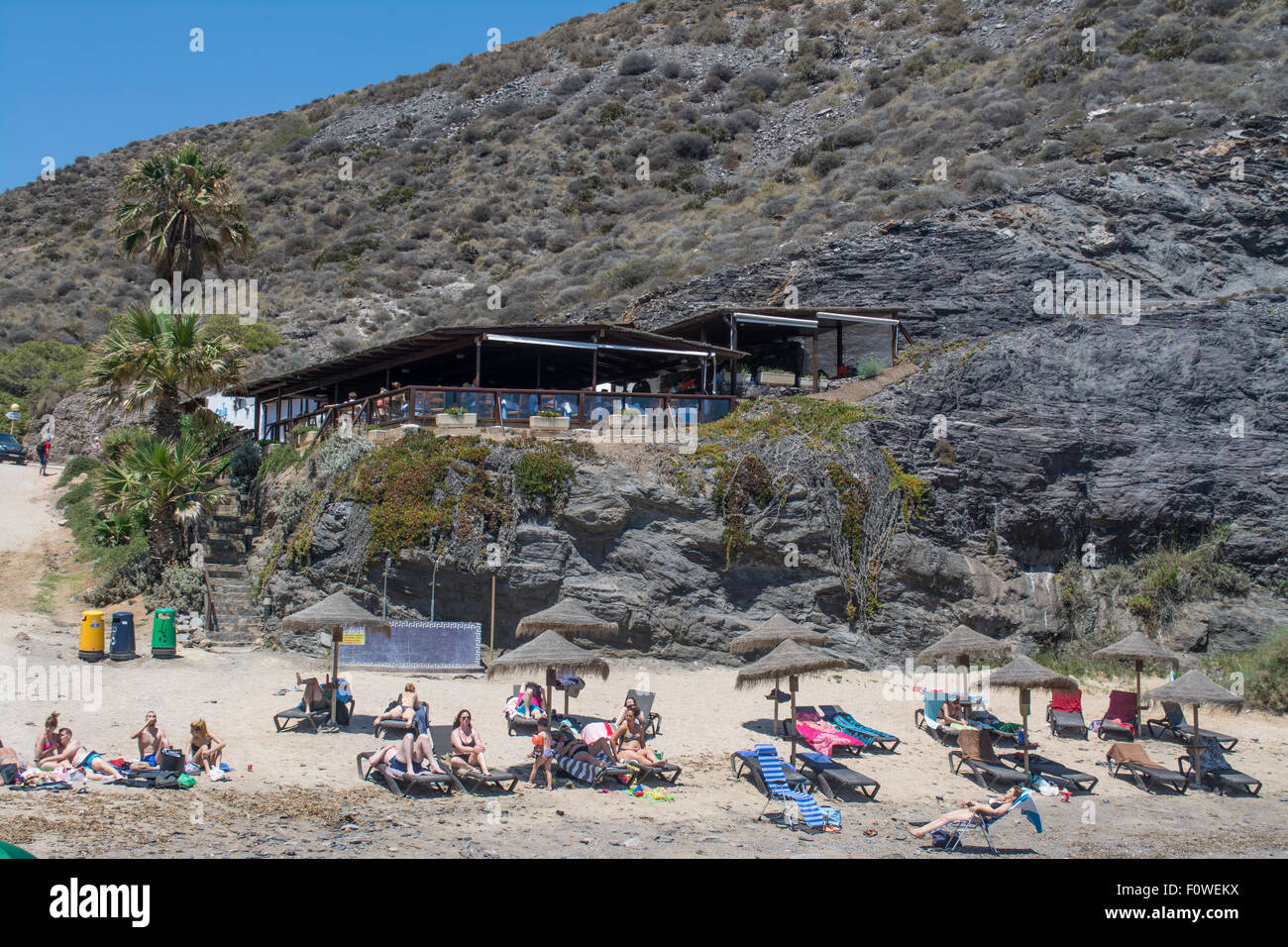 Beach cliff restaurant la cala sunbathers hi-res stock photography and ...